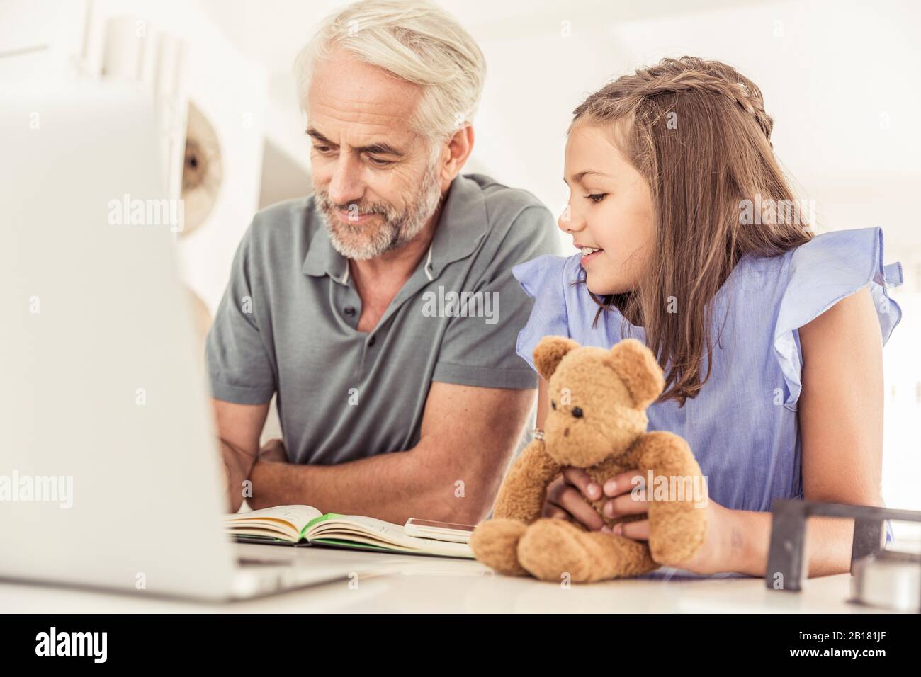 Child working child watching hi-res stock photography and images - Alamy