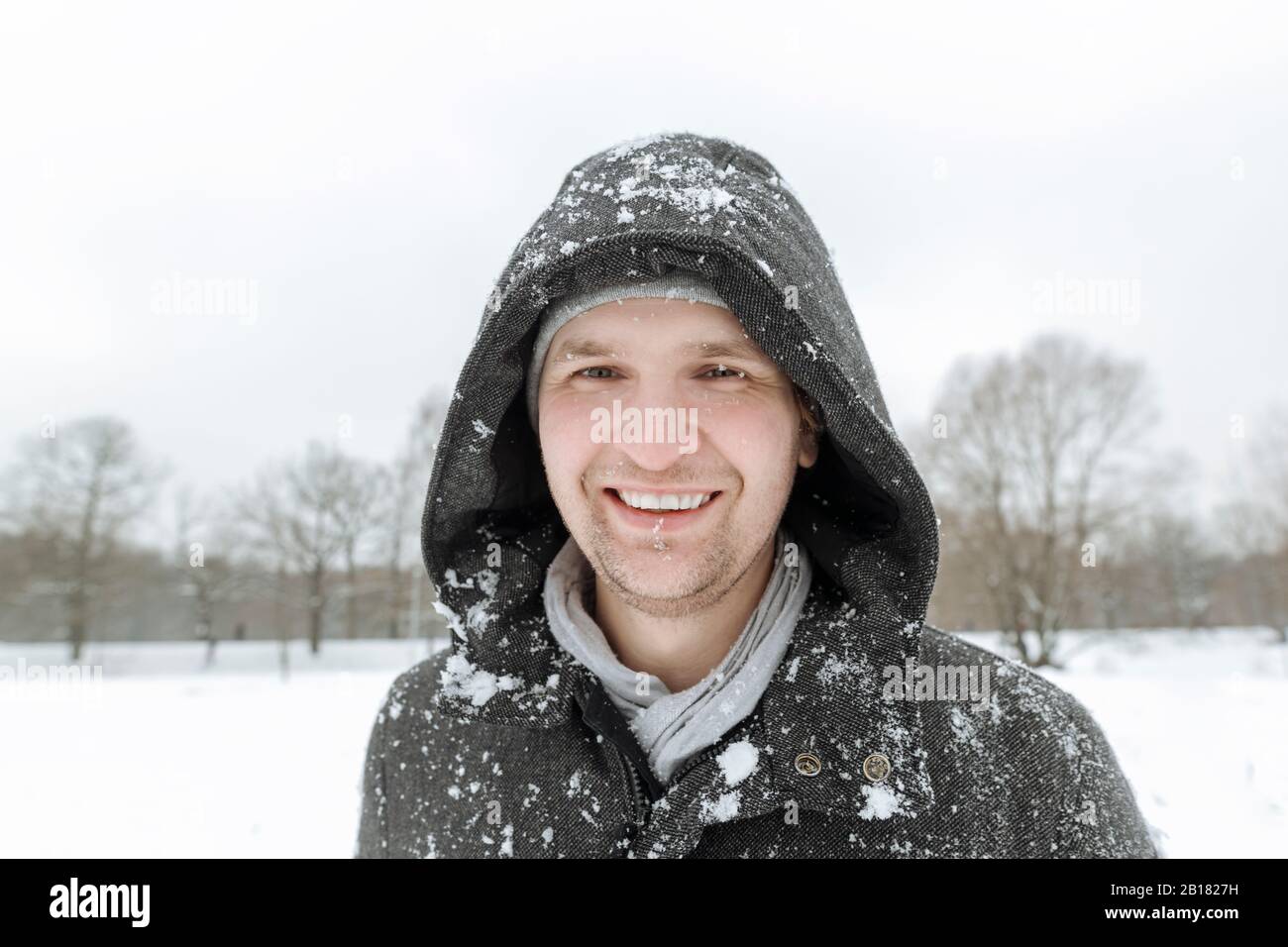 Man enjoying snowfall hi-res stock photography and images - Alamy