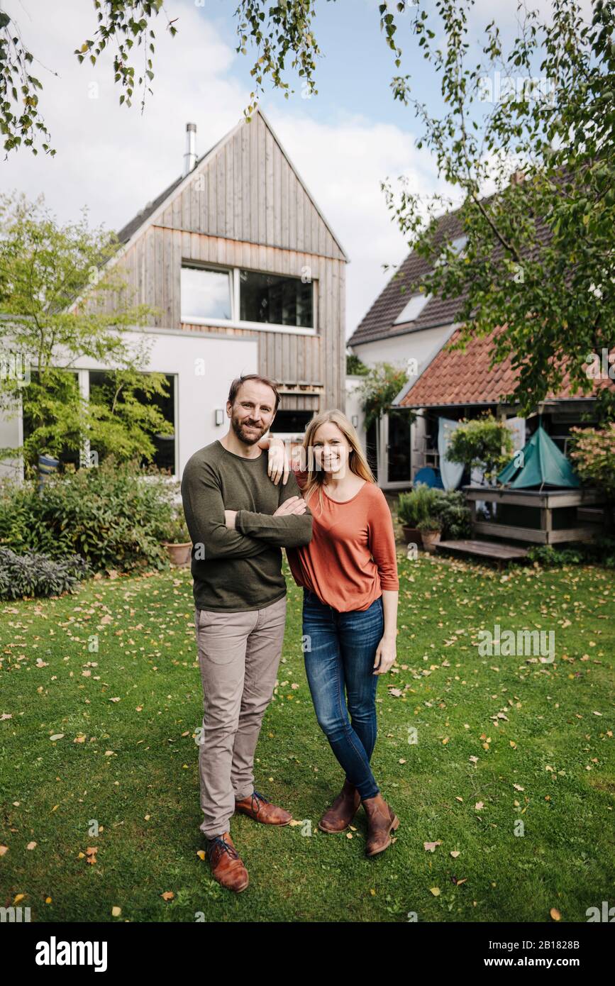 Two men standing crossing arms hi-res stock photography and images - Alamy