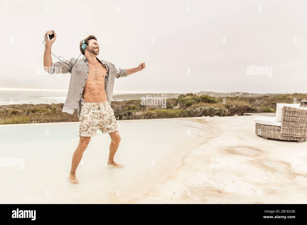 Emotional young man listening hi-res stock photography and images - Alamy