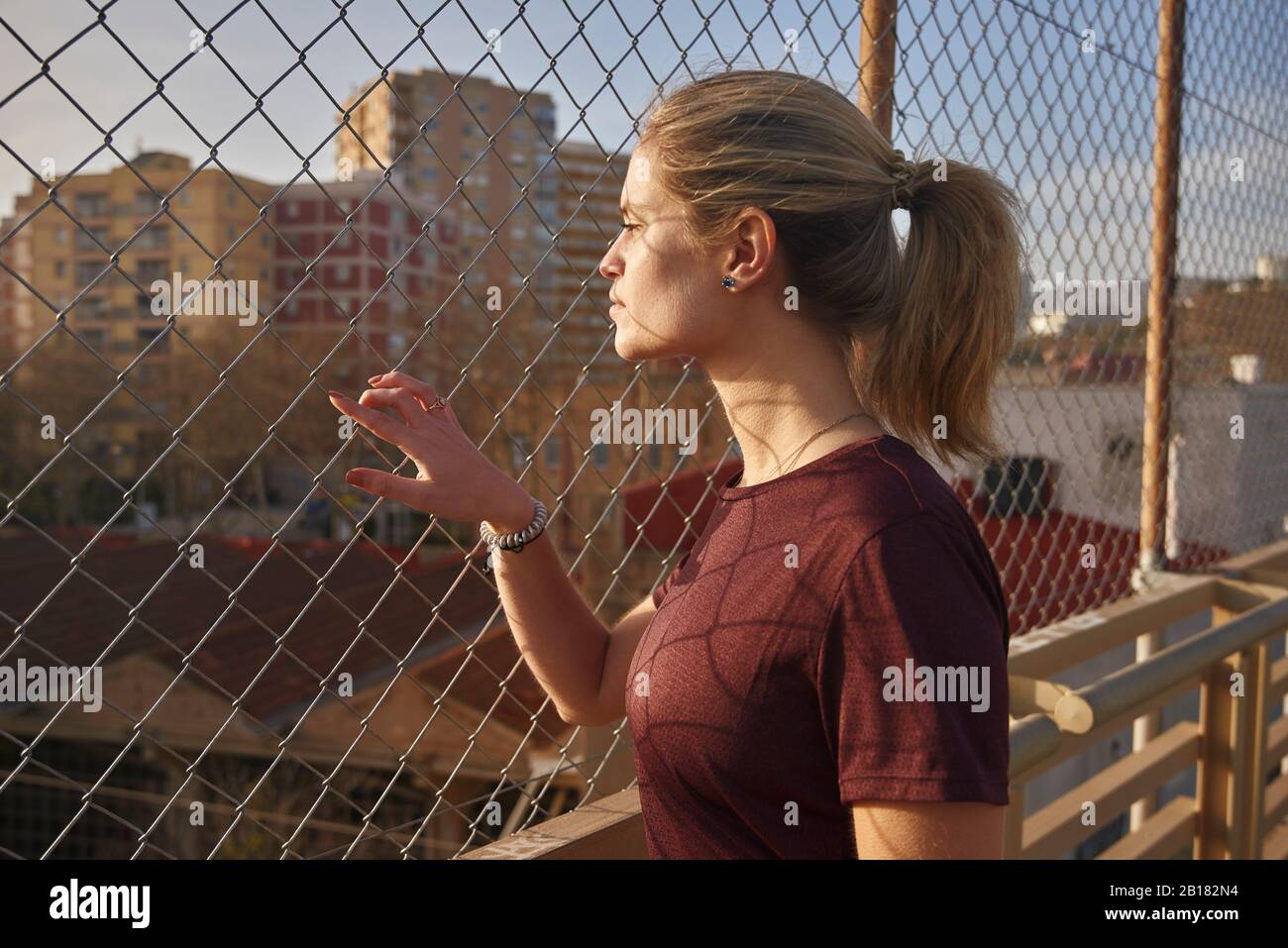 Sunset view through fence hi-res stock photography and images - Alamy