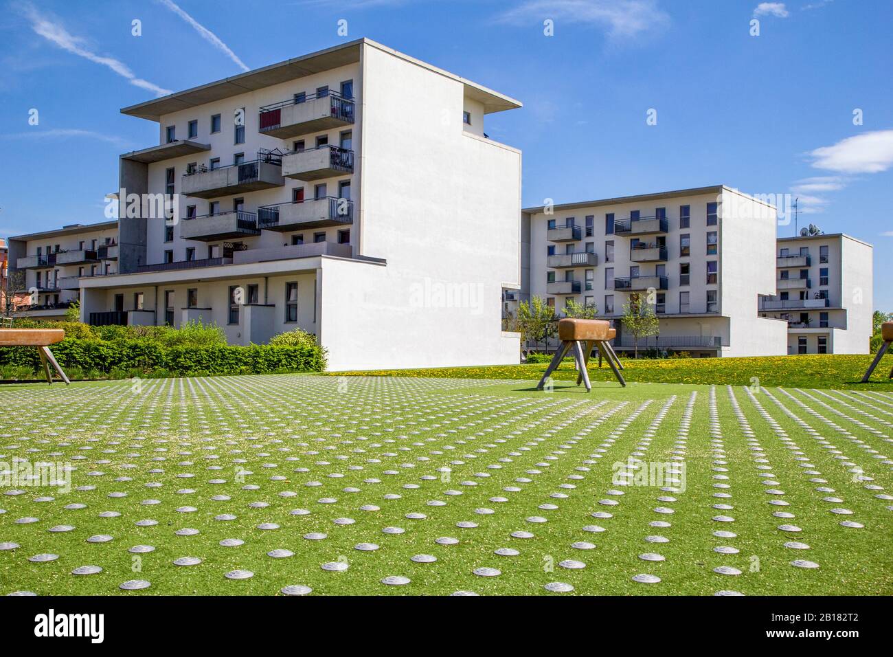 Germany, Bavaria, Munich, Playground with gymnastics vaults in front of ...