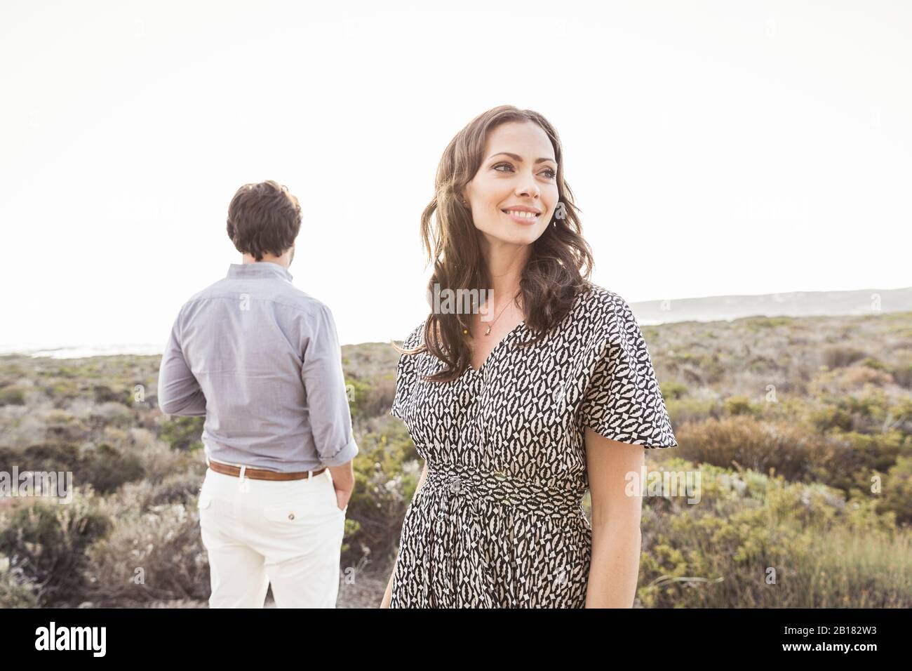 Female tourist looking around standing hi-res stock photography and ...
