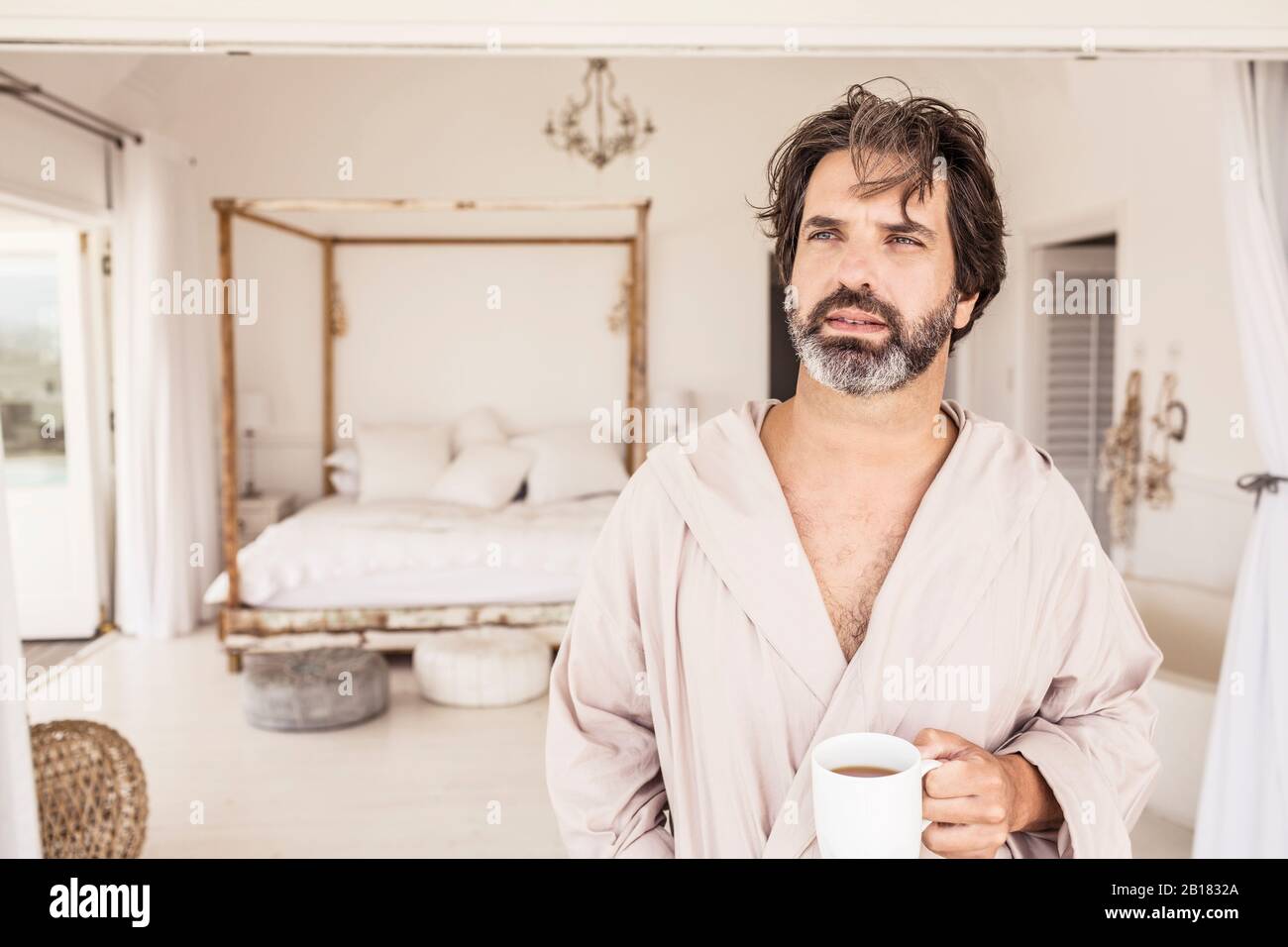 Man bathrobe bed hi-res stock photography and images - Alamy