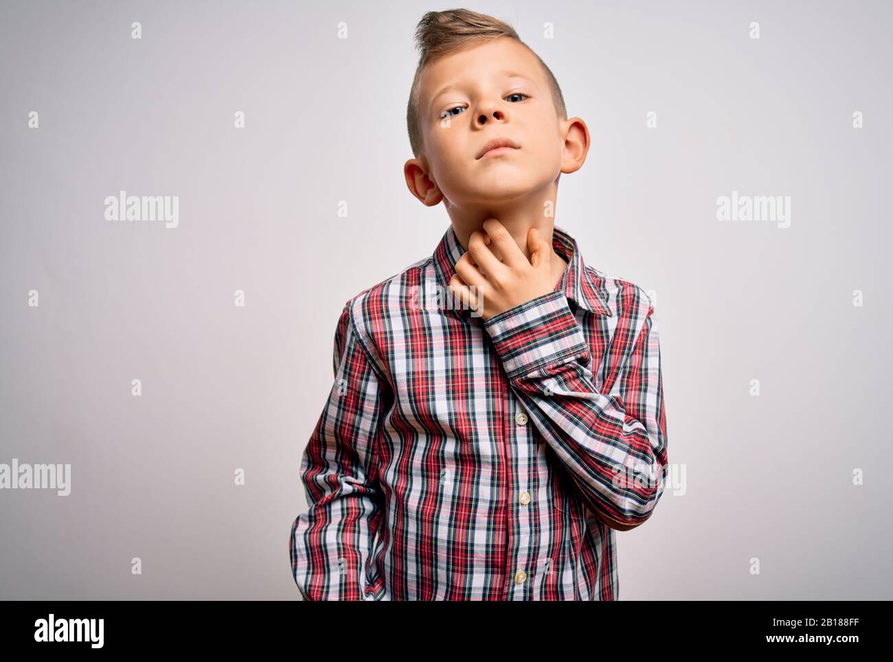 Young little caucasian kid with blue eyes wearing elegant shirt ...