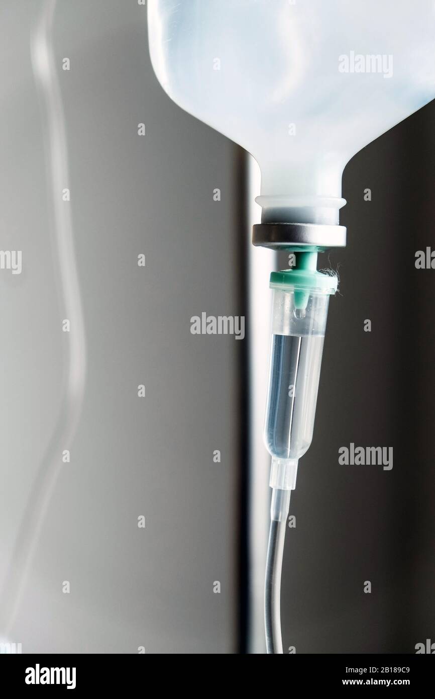 Medical Care,Close up of IV saline solution drip for patient in ...