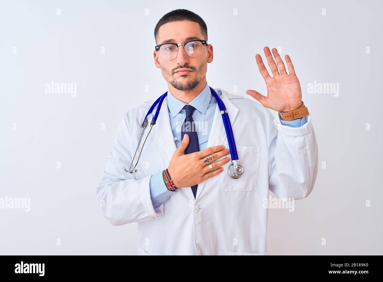 Young doctor man wearing stethoscope over isolated background Swearing ...