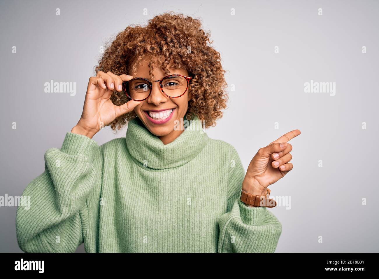 African american optical woman with curly hair wearing glasses over ...