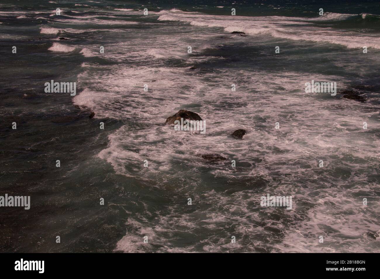 White water caused by rocks in shallows off Umhlanga beach Stock Photo ...
