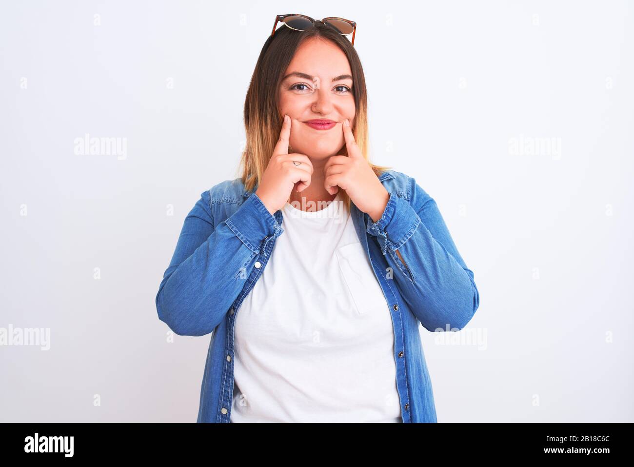 Beautiful Woman Wearing Denim Shirt Standing Over Isolated White