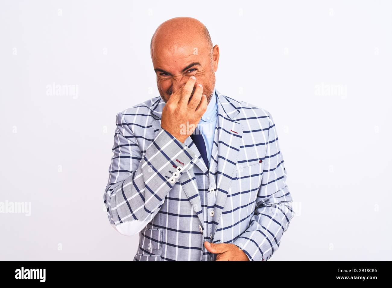 Middle age businessman wearing suit standing over isolated white ...