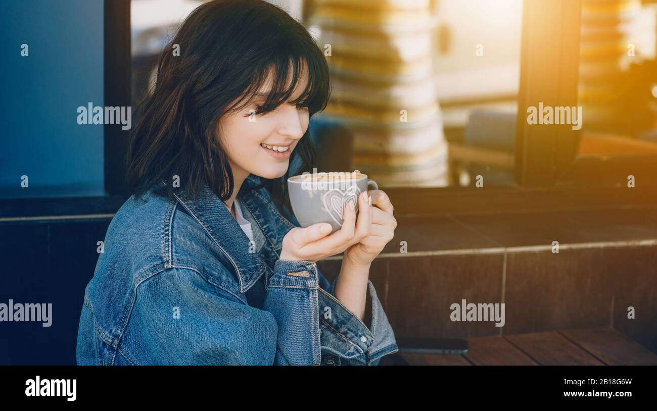 Model drinking coffee shop hi-res stock photography and images - Alamy