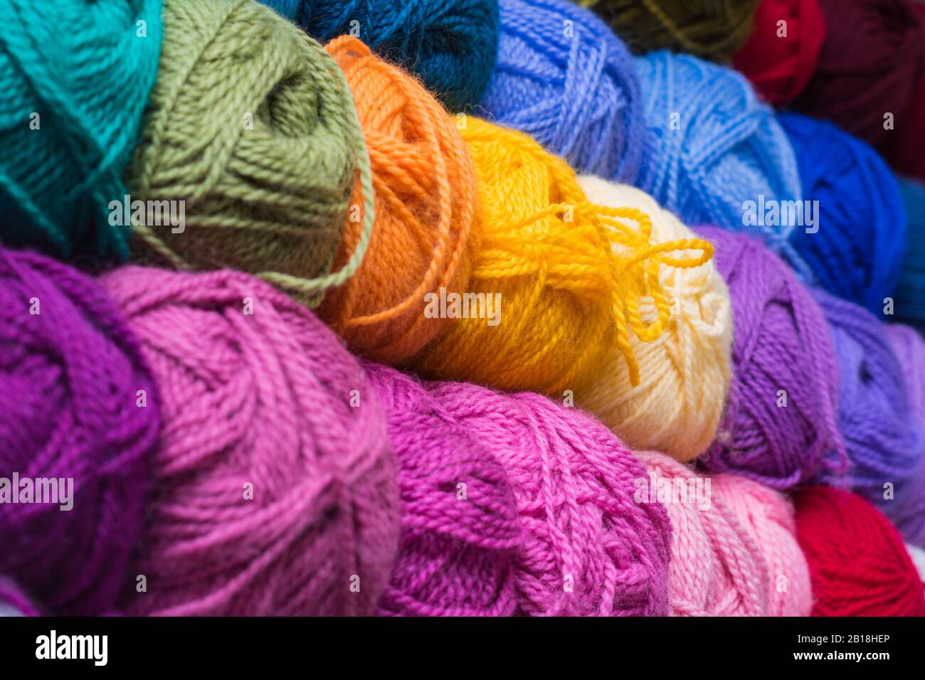 Different colors wool balls on shop display stand for sale Stock Photo ...