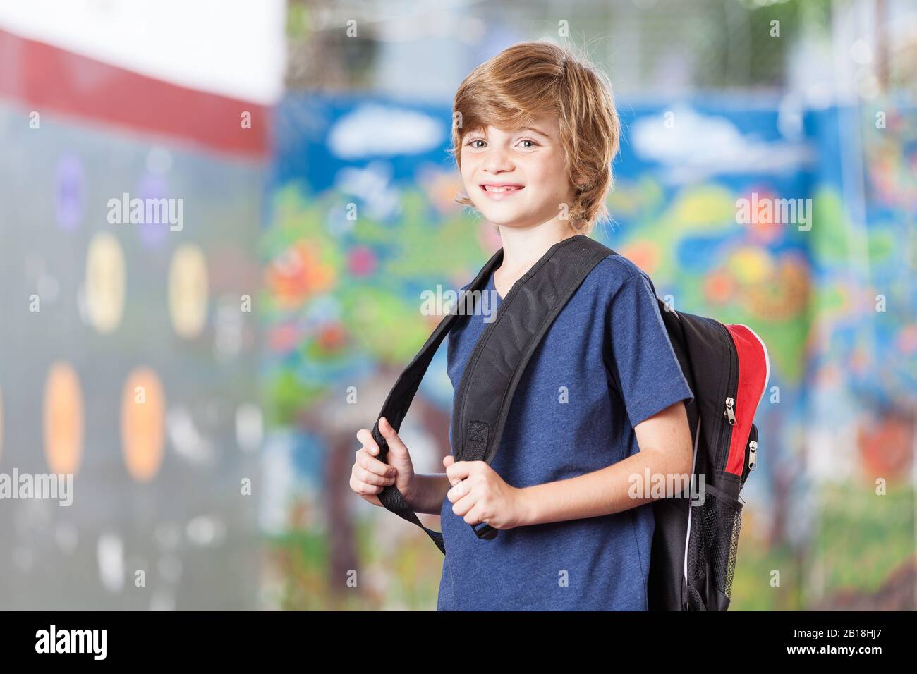 Boy at elementary school Stock Photo - Alamy