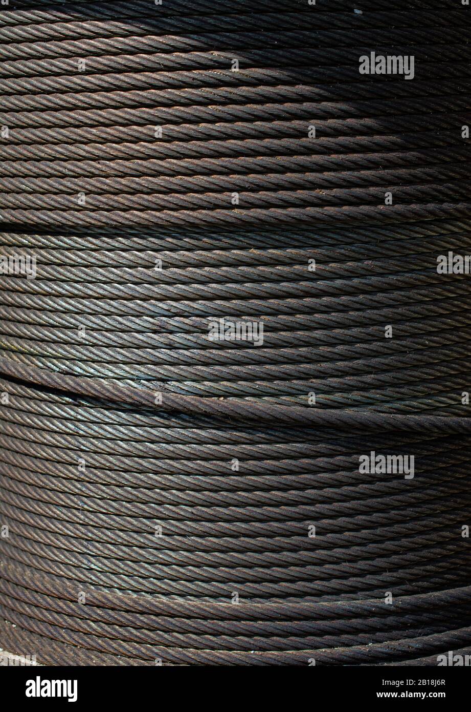Metal wire roll close-up. Pattern of cables in view Stock Photo - Alamy
