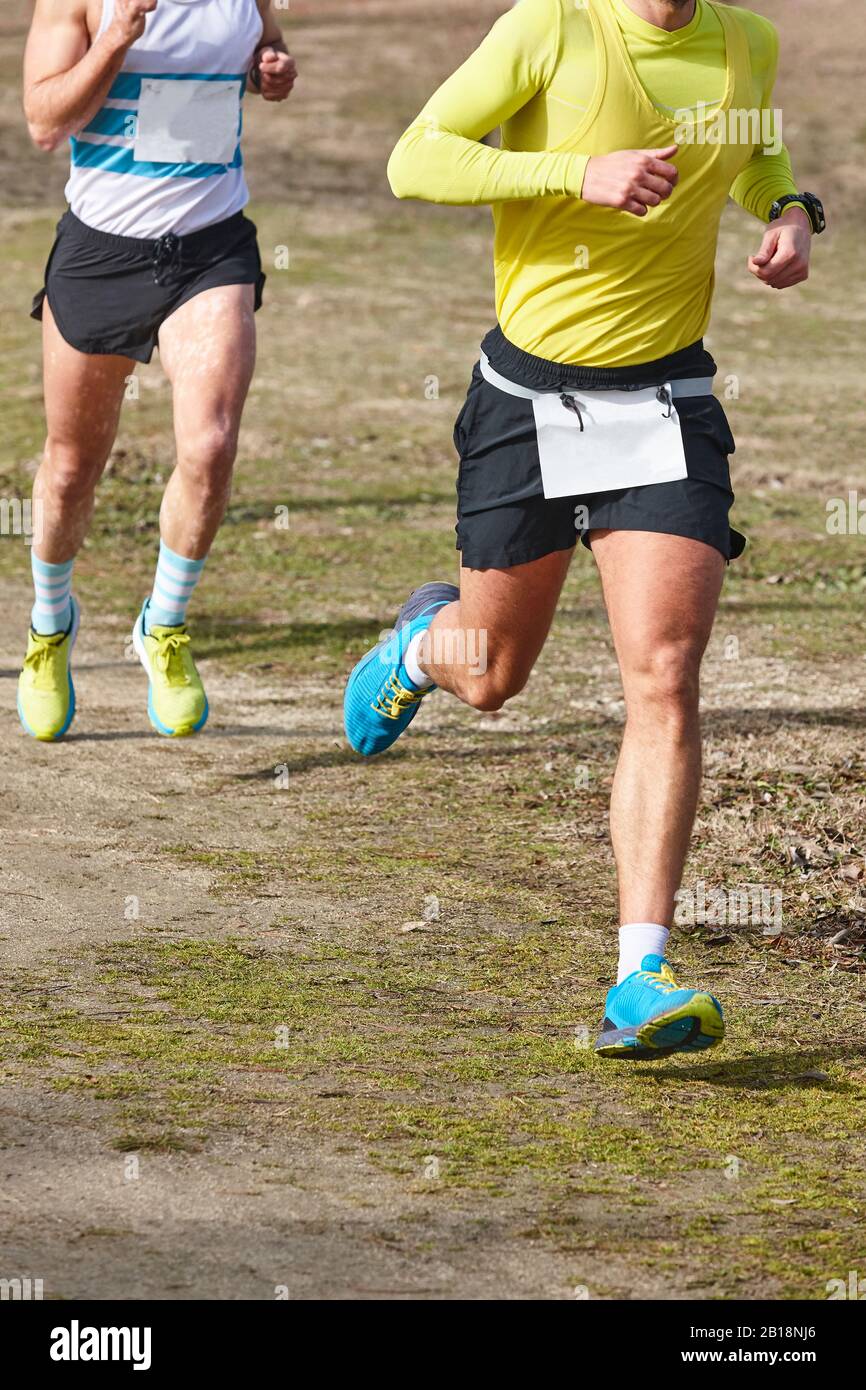 Cross country runners on a race. Active healthy outdoor lifestyle Stock ...
