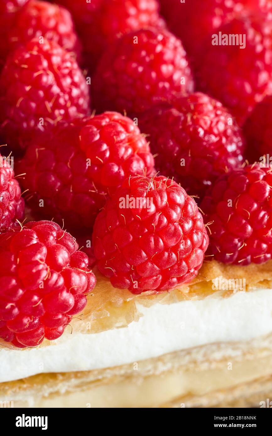 Delicious raspberry cake with puff pastry and cream. Homemade dessert ...