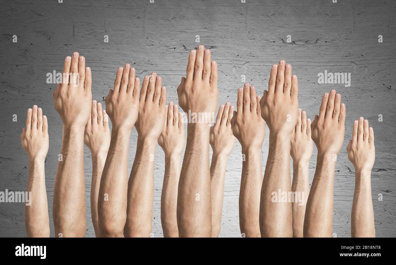 Row of man hands showing voting gesture Stock Photo - Alamy