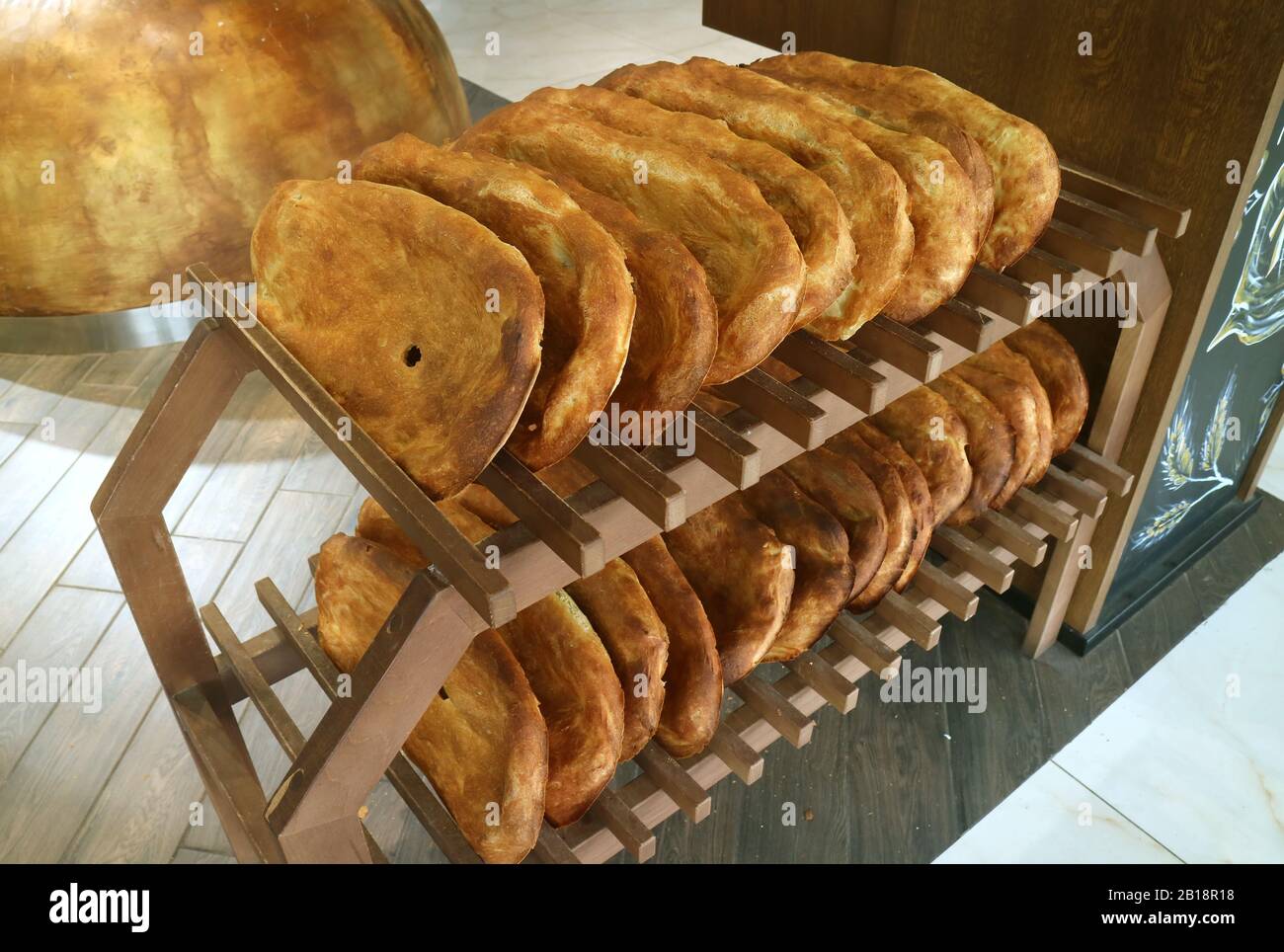 Armenian traditional breads for sale on the bakery wooden shelfs Stock ...