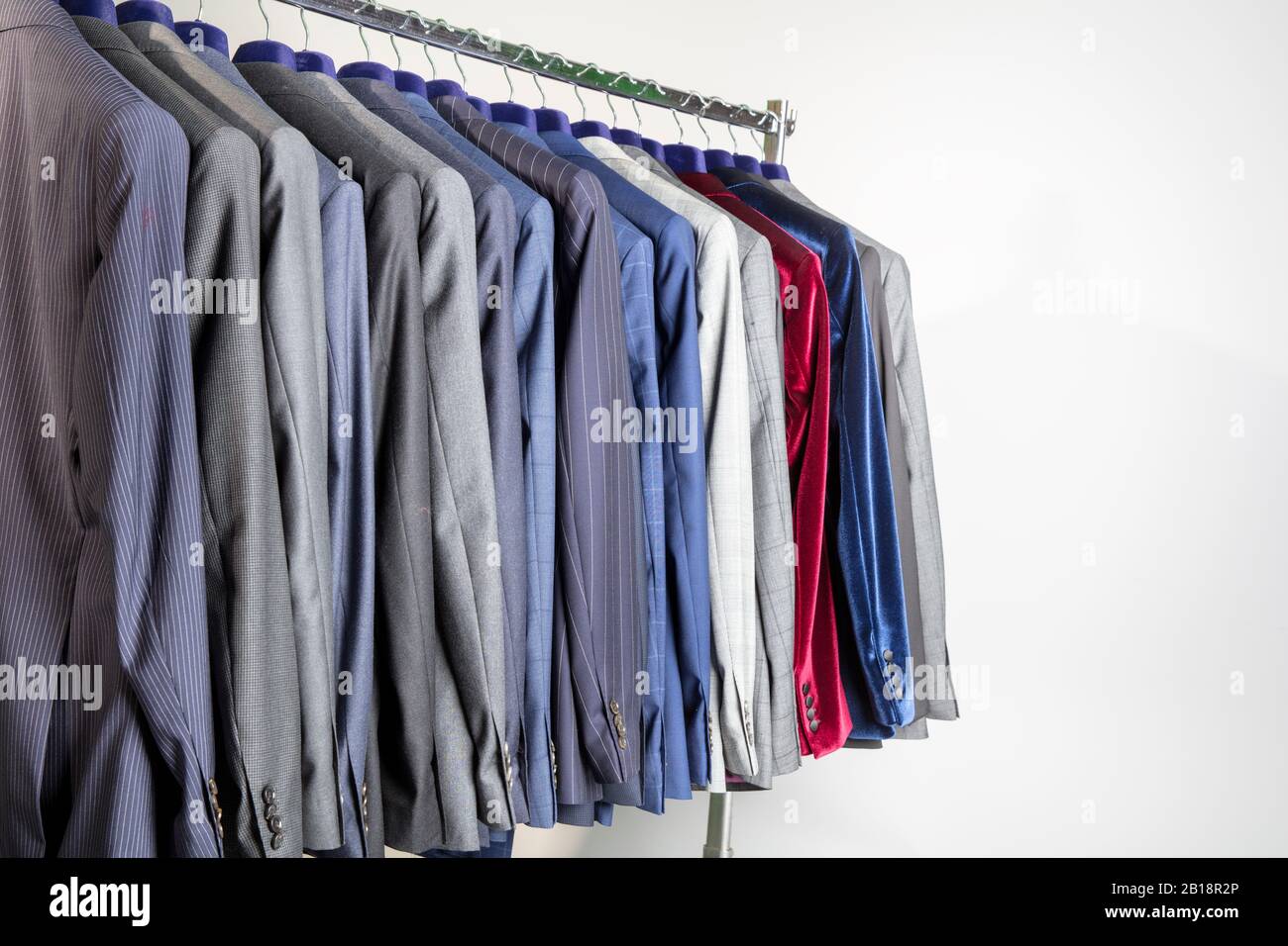 Mens suits on rack hi-res stock photography and images - Alamy