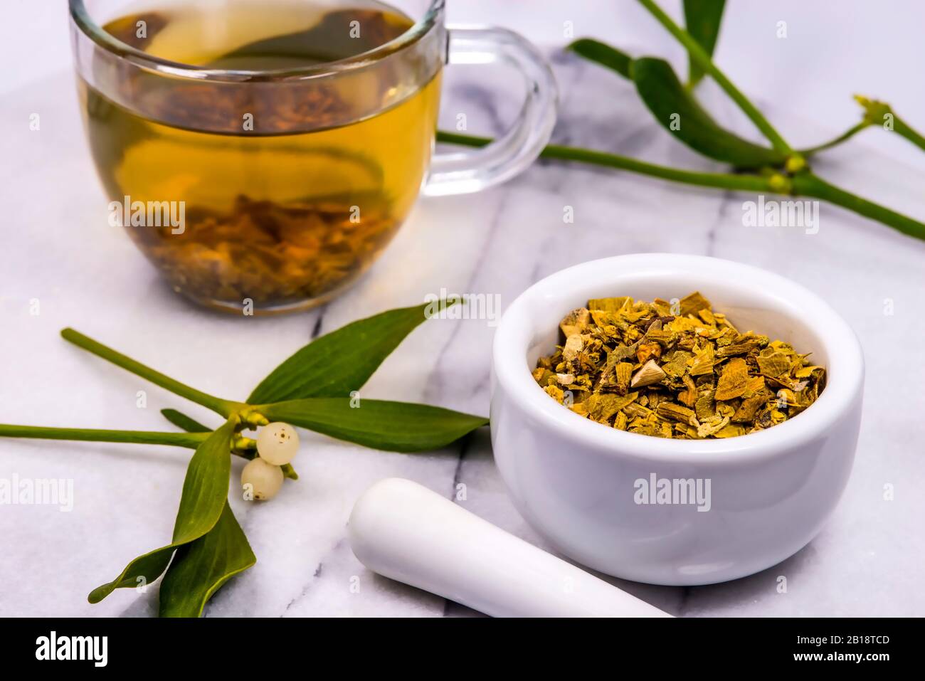 Mistletoe, tea with mortar and frehs and dried mistletoe drug Stock ...