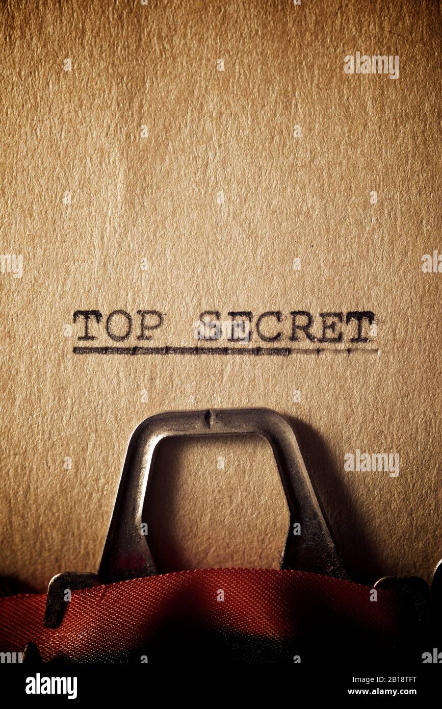 The sentence, Top Secret, written with a typewriter Stock Photo - Alamy