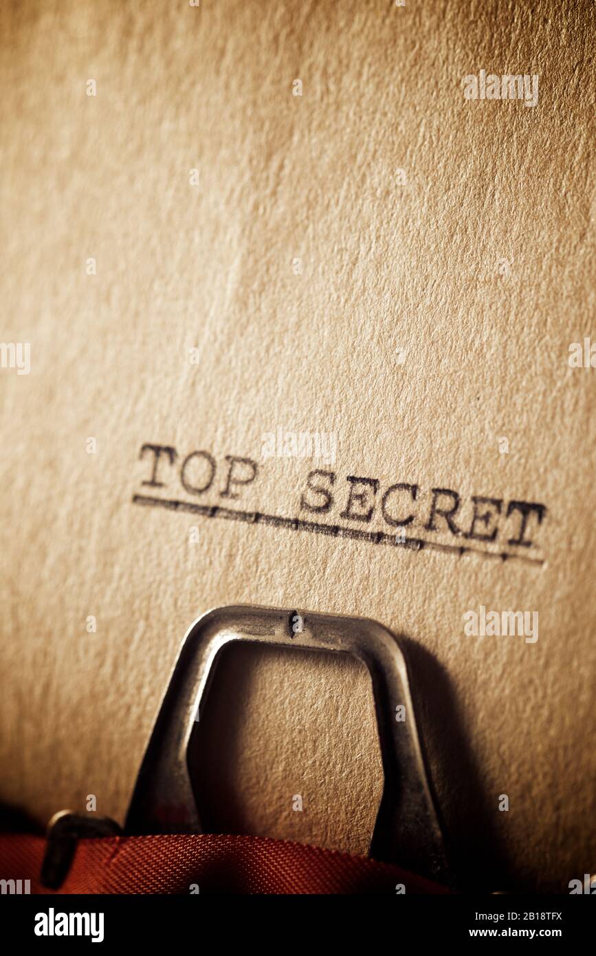 The sentence, Top Secret, written with a typewriter Stock Photo - Alamy