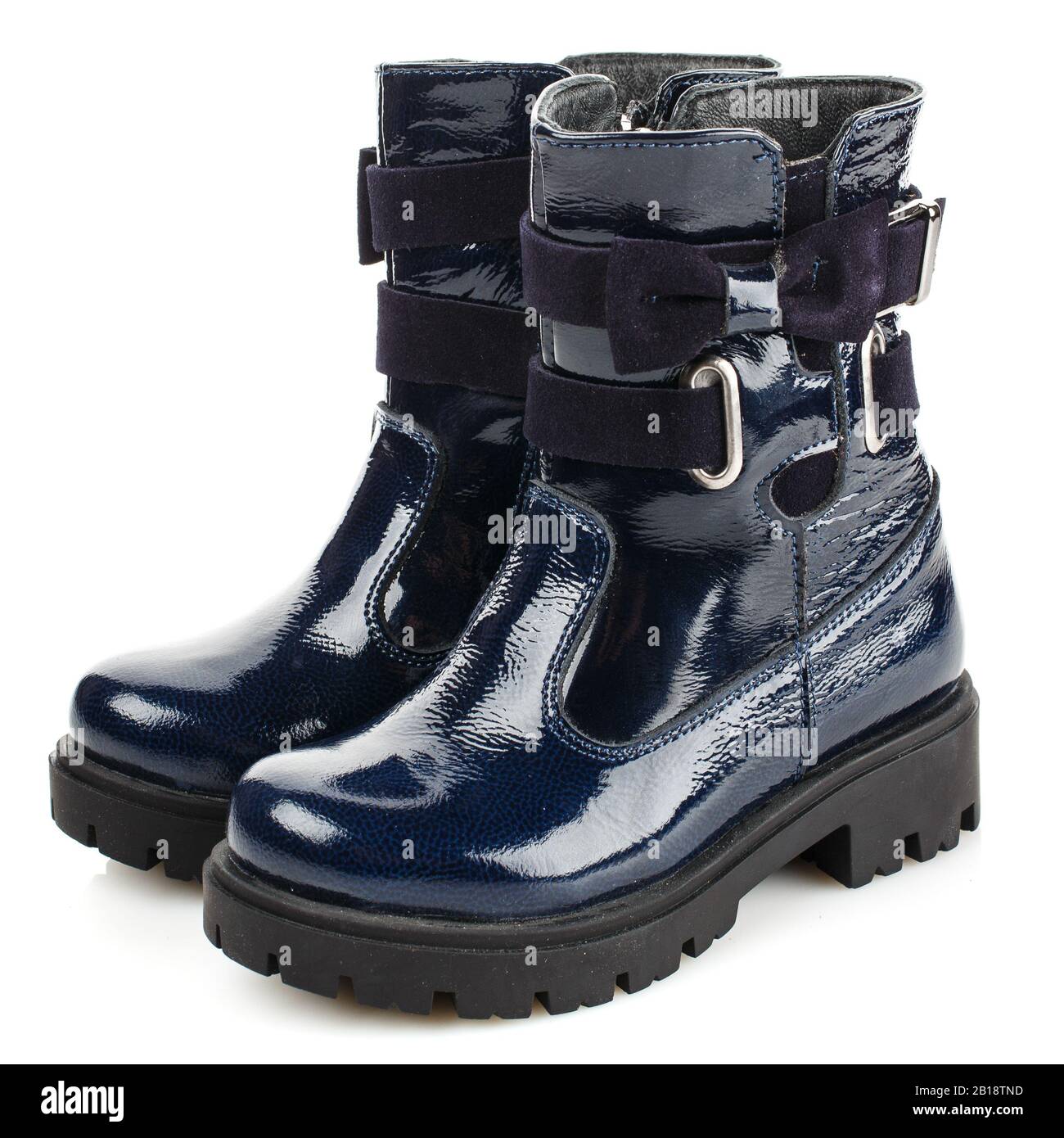 Dark blue lacquer boots for girls isolated on white. Side view Stock ...