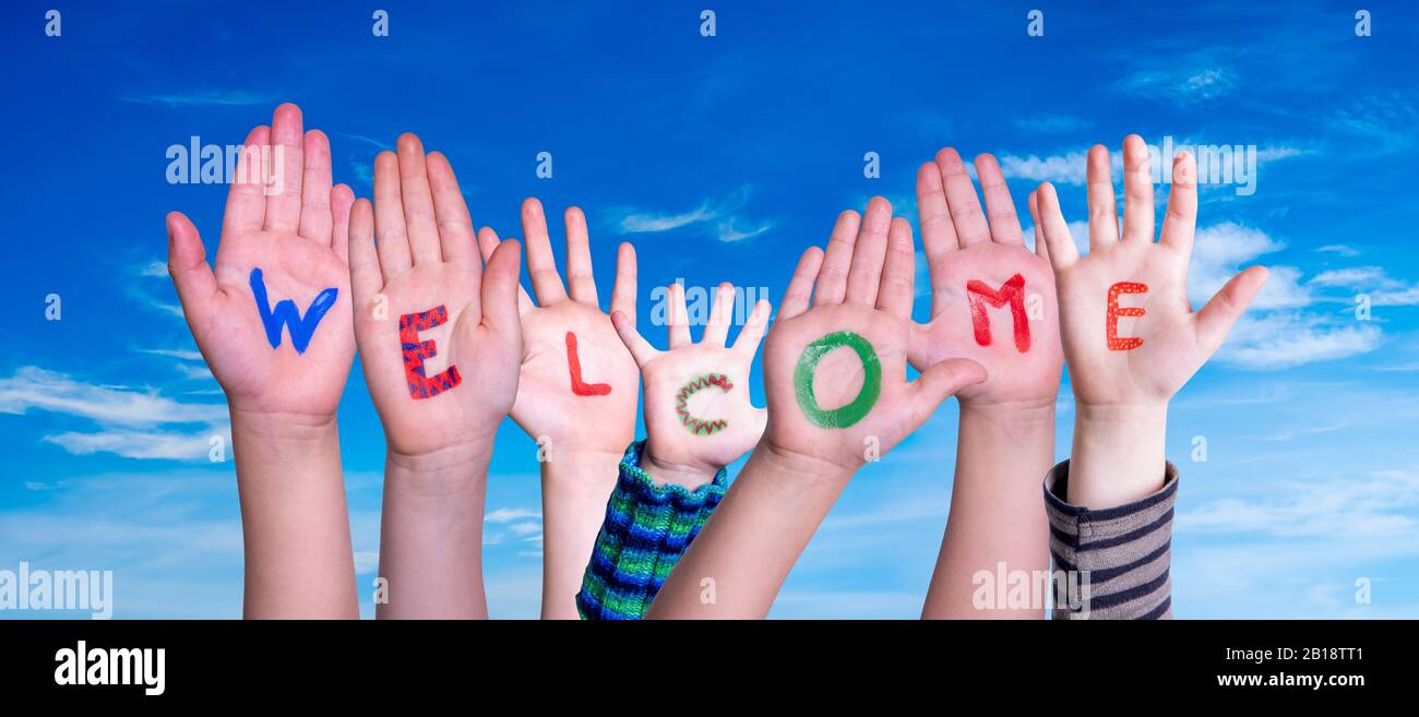 Many Different Children Hands Building Word Welcome, Deep Blue Sky ...