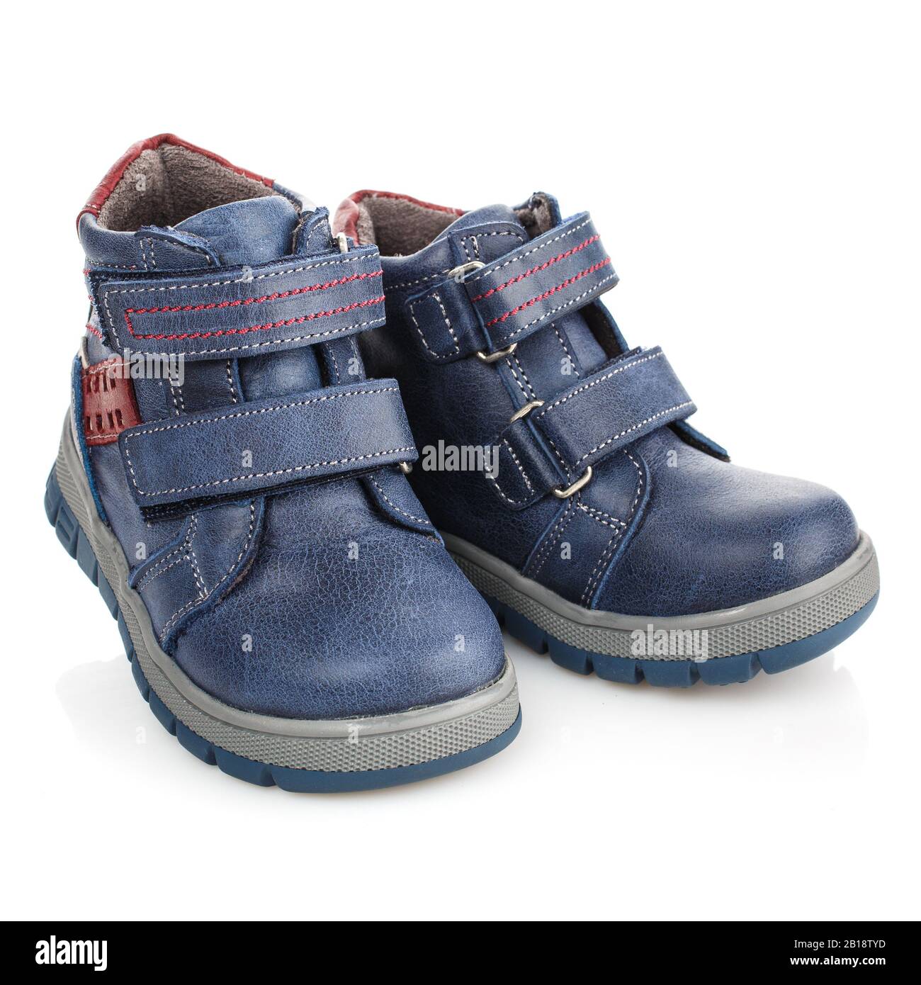 Children's blue shoes for boys isolated on white Stock Photo - Alamy