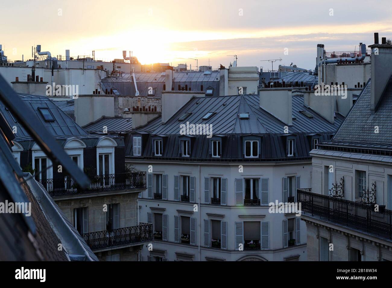 Sunset in Paris. Iconic Parisian Buildings Rooftop View in Rays of the ...