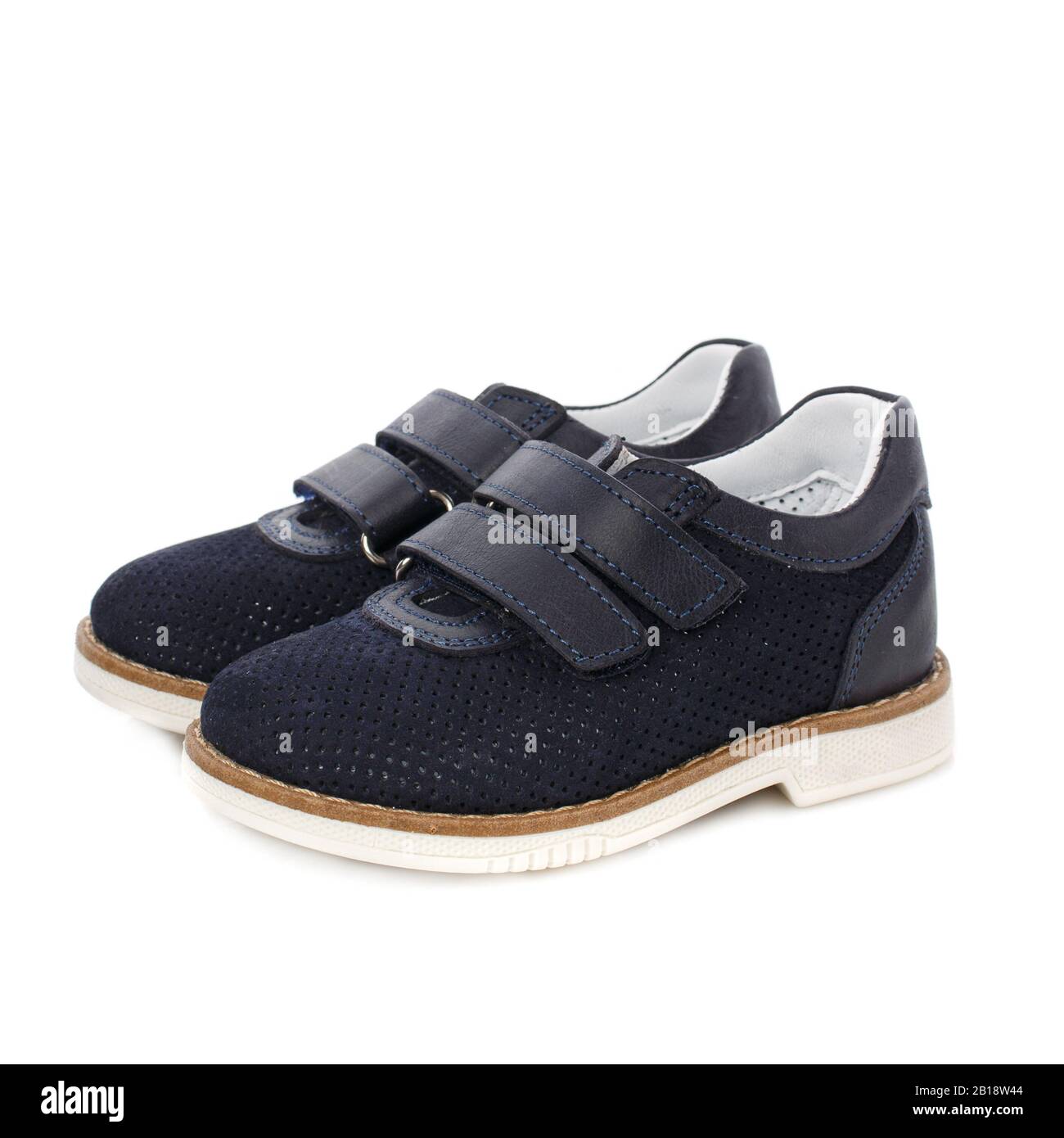 Children's dark blue shoes isolated on white. Side view Stock Photo - Alamy