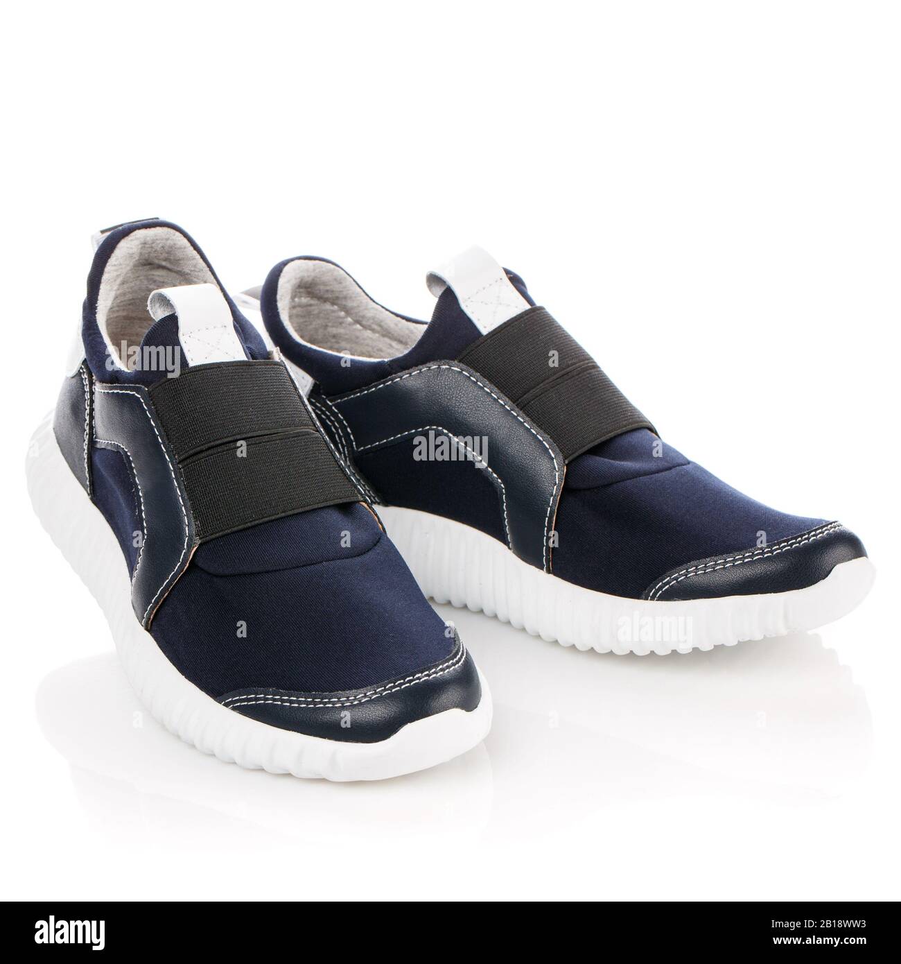 Dark blue shoes for boys isolated on white Stock Photo - Alamy