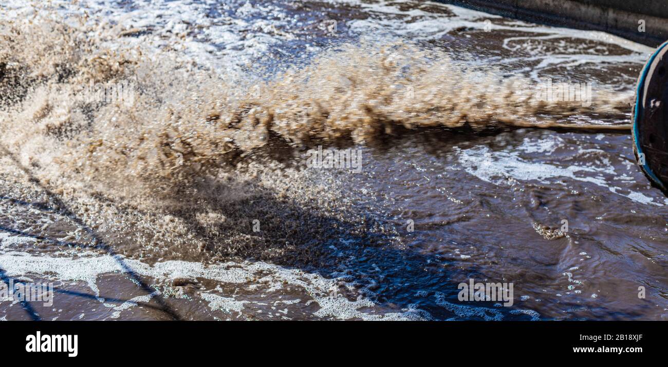 Treatment plant. Dirty water flows from the pipes. Environmental ...