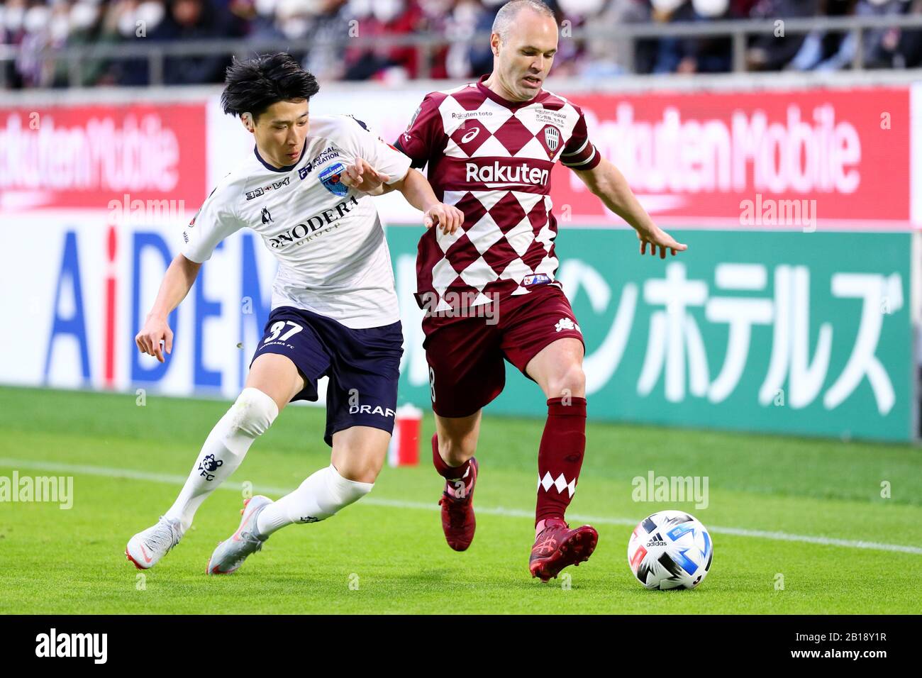 Hyogo, Japan. 23rd Feb, 2020. (L-R) Yusuke Matsuo (Yokohama FC), Andres ...