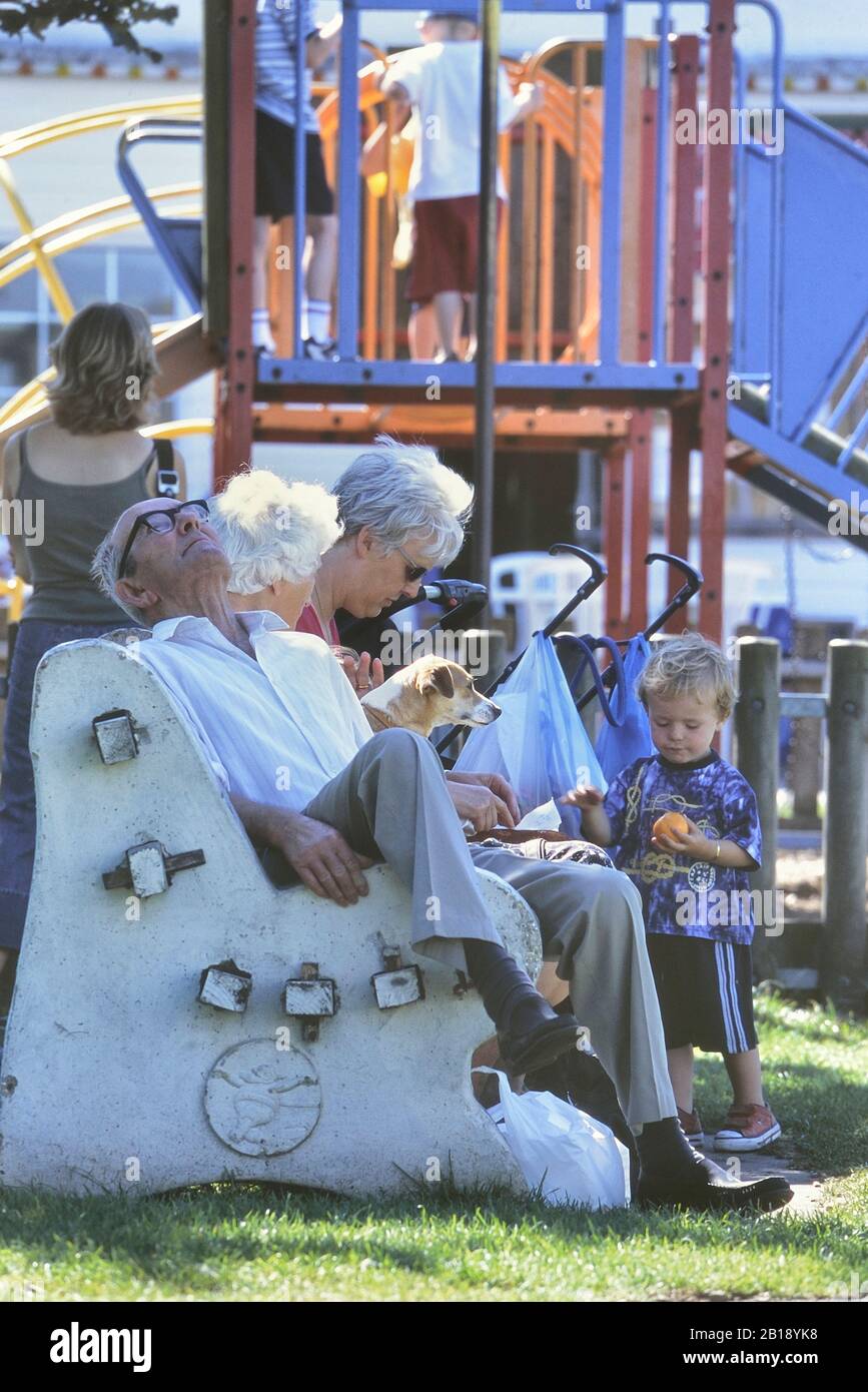 Multigenerational family at a playground, Skegness, Lincolnshire ...