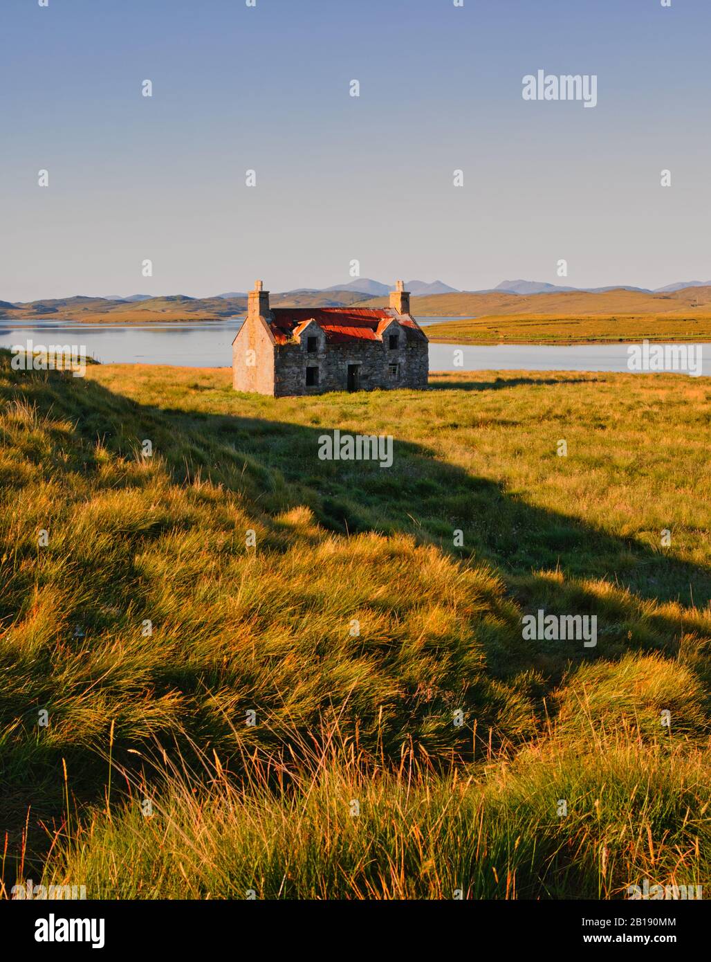 Abandoned croft house next to loch, Isle of Lewis, Outer Hebrides ...