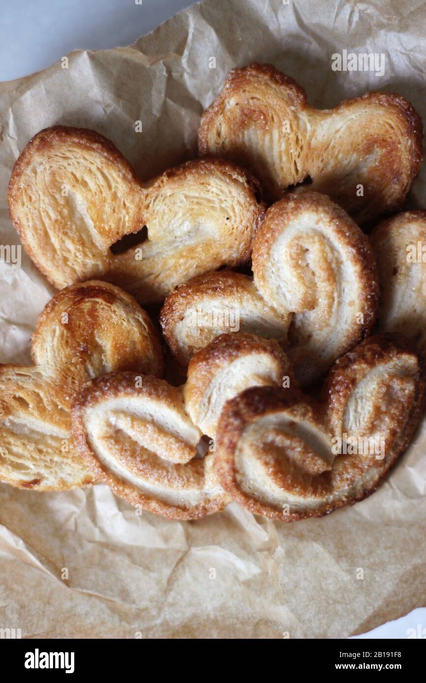 Puff pastry cookies ears hi-res stock photography and images - Alamy