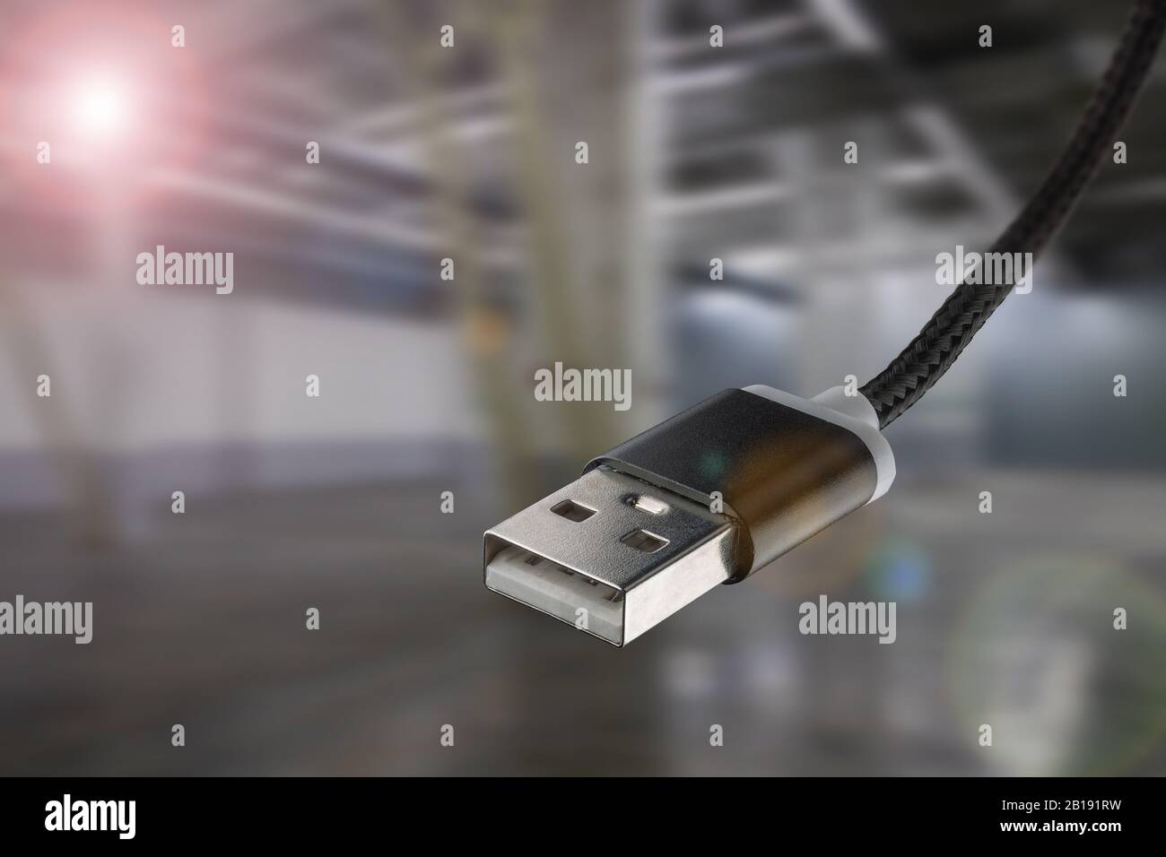USB cable on an industrial background Stock Photo - Alamy