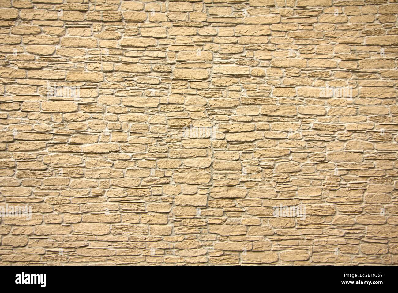 Stone wall texture, square yellow travertine tile. Design element or ...