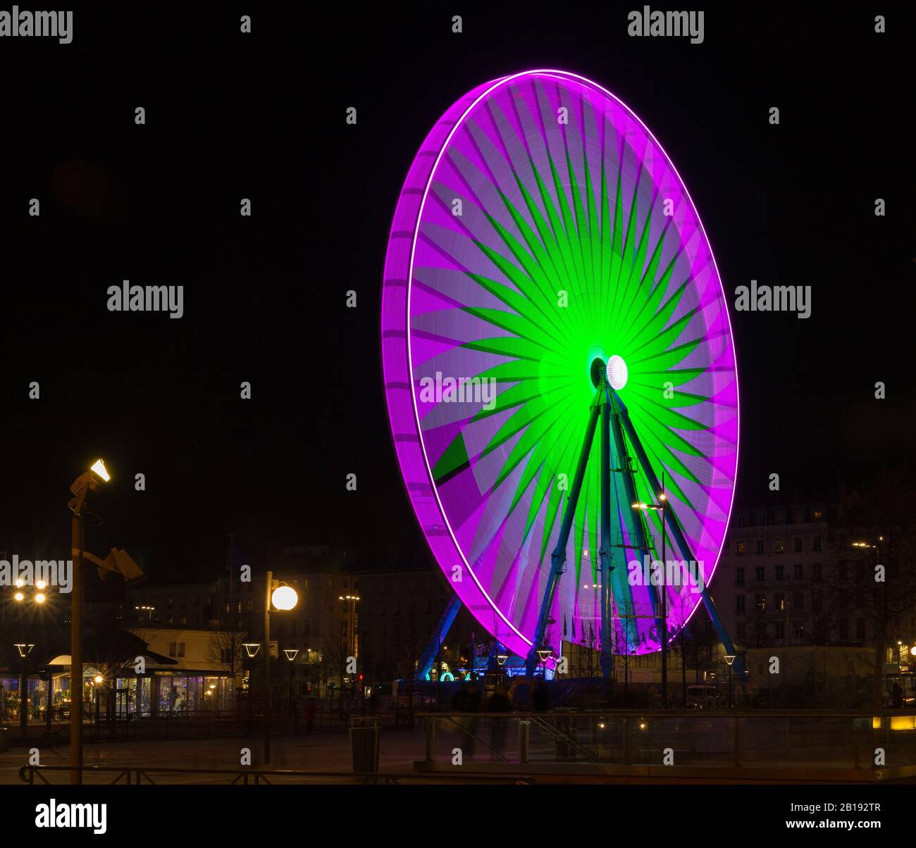 Show on the big multicolored wheel of Bellecour square. The Festival of ...
