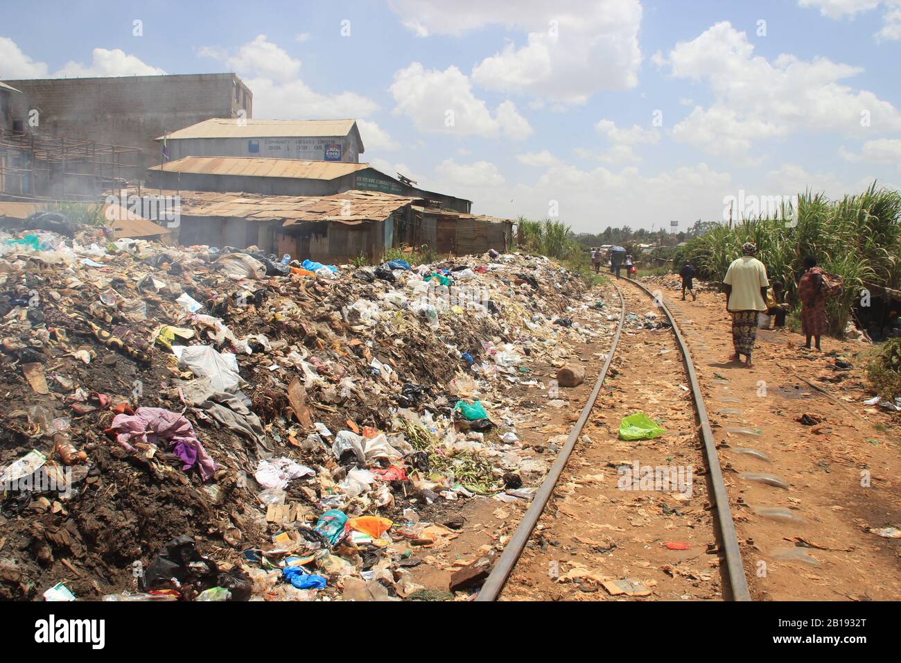 Kibera, Nairobi, Kenya - February 13, 2015: a huge mountain of garbage ...