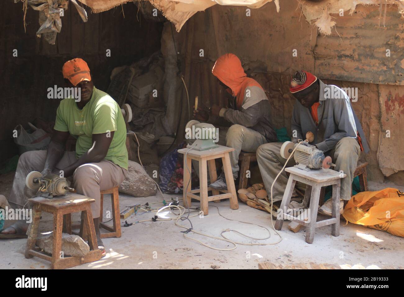 Kibera, Nairobi, Kenya - February 13, 2015: Three African young men ...