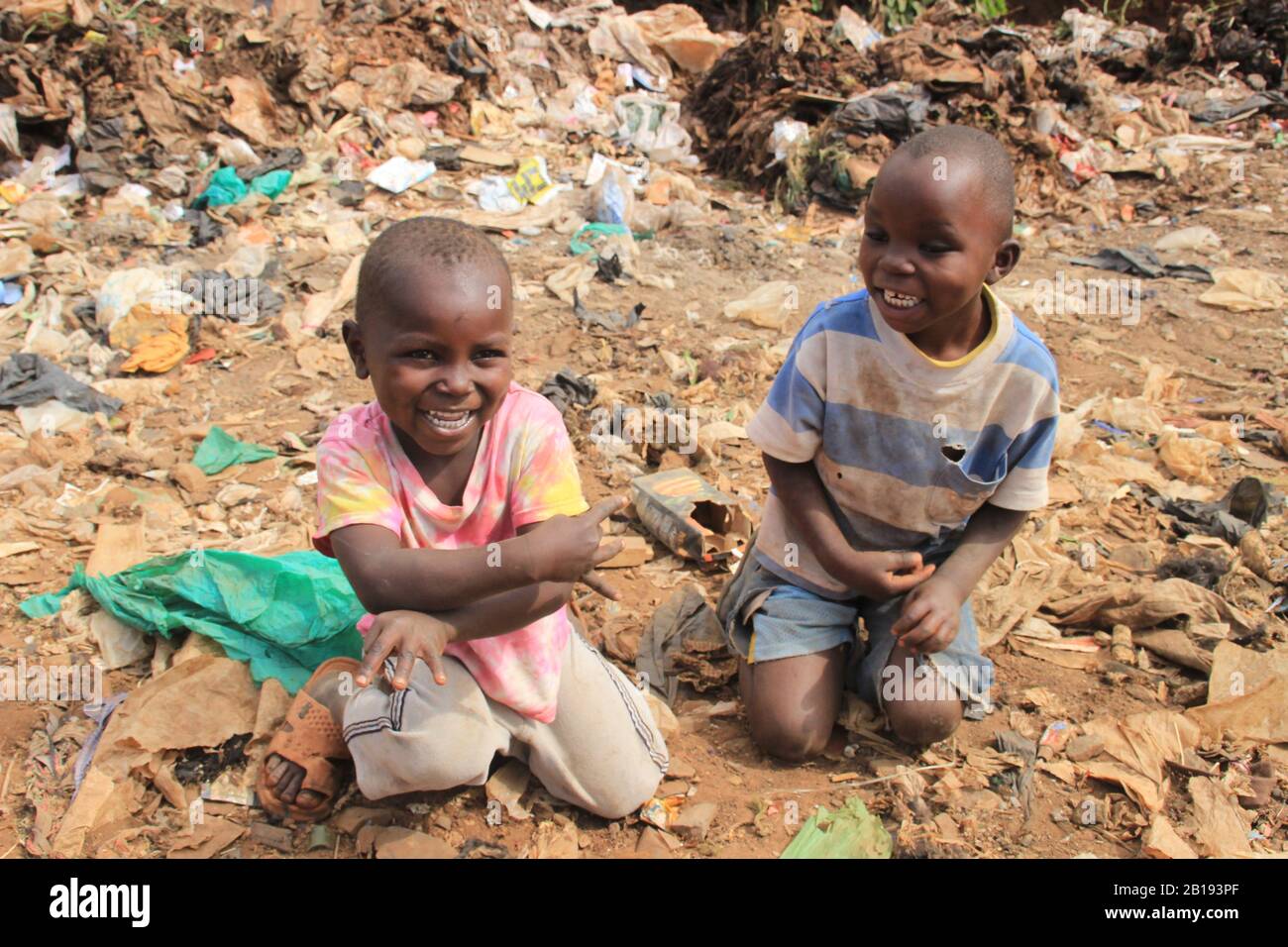Kibera, Nairobi, Kenya - February 13, 2015: Two poor black boys in the ...