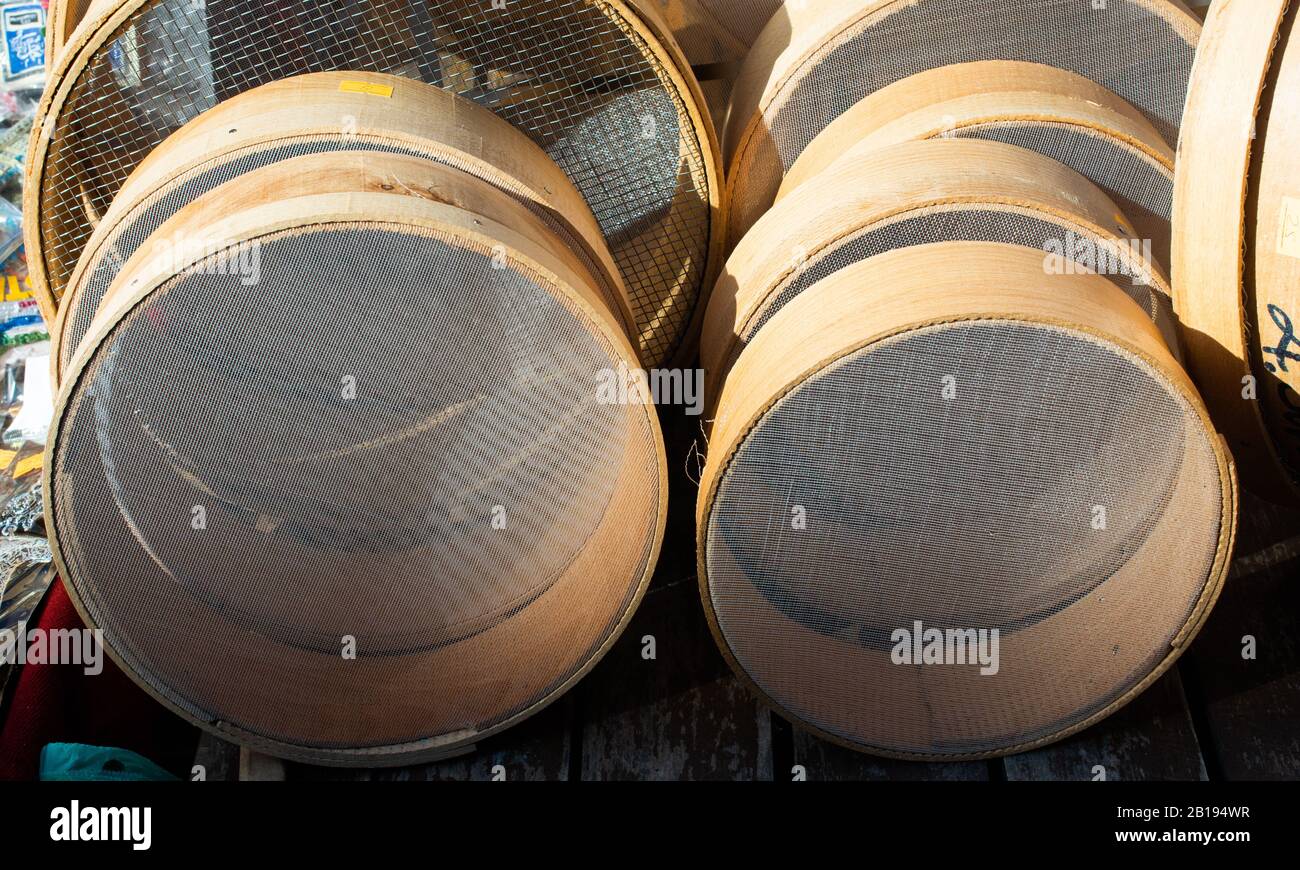 Traditional type sieves made of wood Stock Photo - Alamy