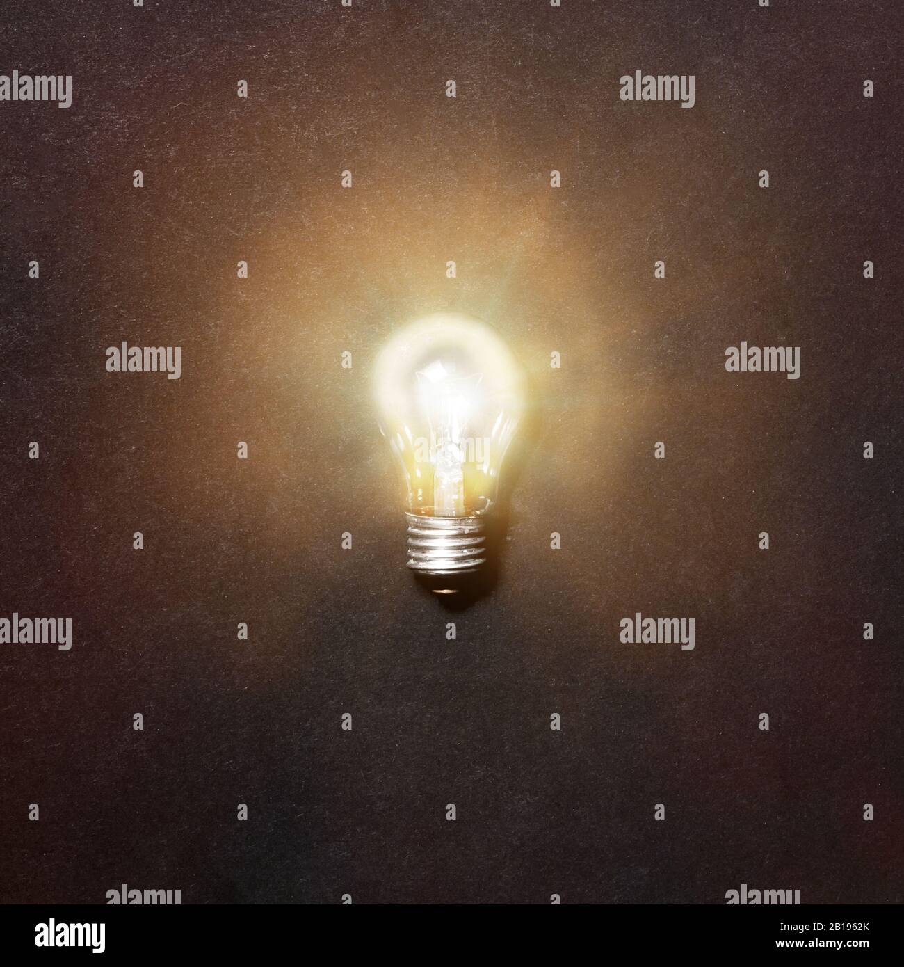 Glowing light bulb. Realistic image of included tungsten light bulb on ...