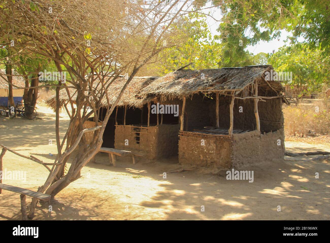 A poor village hut made of wood and clay. The traditional African home ...