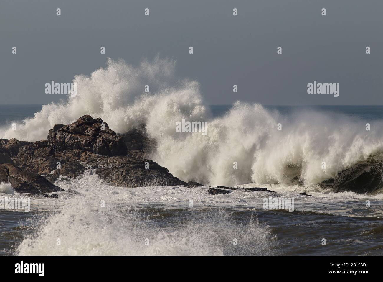 Big wave splash in a stormy but sunny morning. Northern portuguese ...
