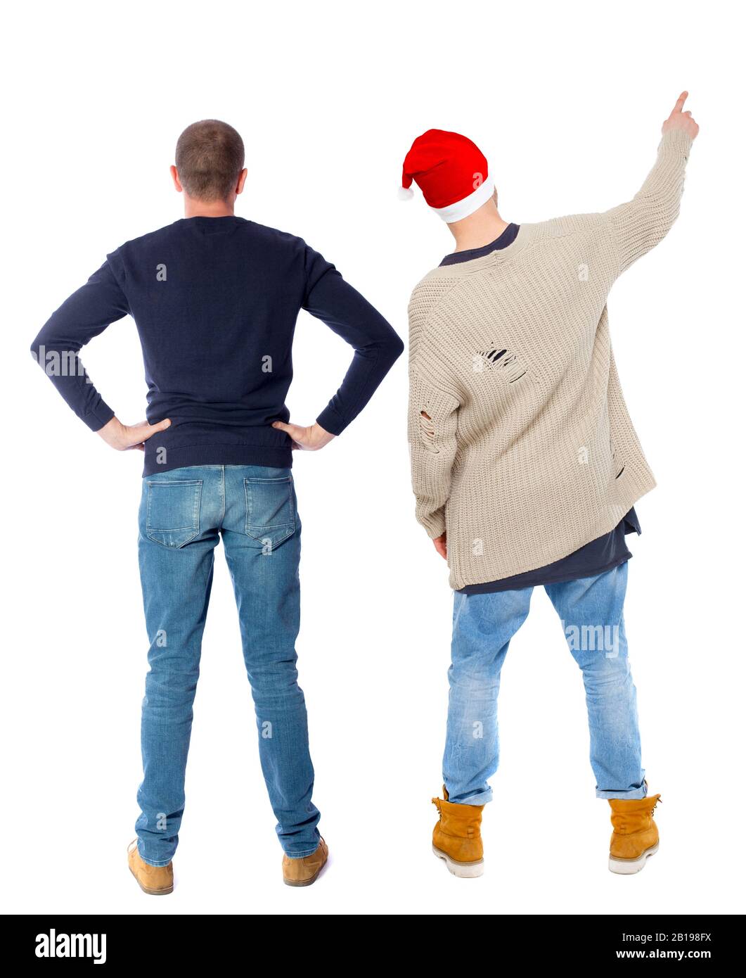 Back view of two man in sweater pointing. Rear view people collection ...