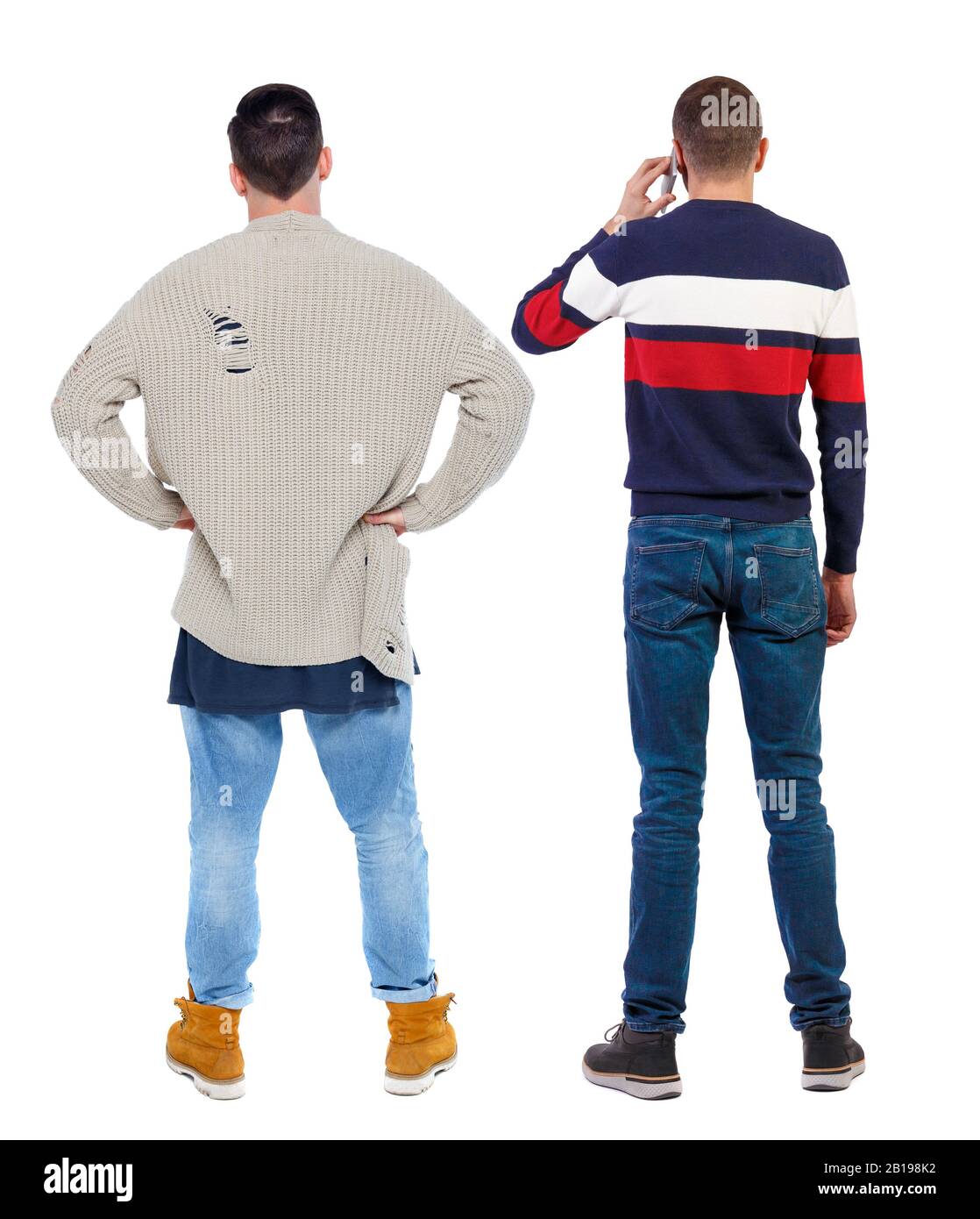 Back view of two man in sweater with mobile phone. Rear view people ...
